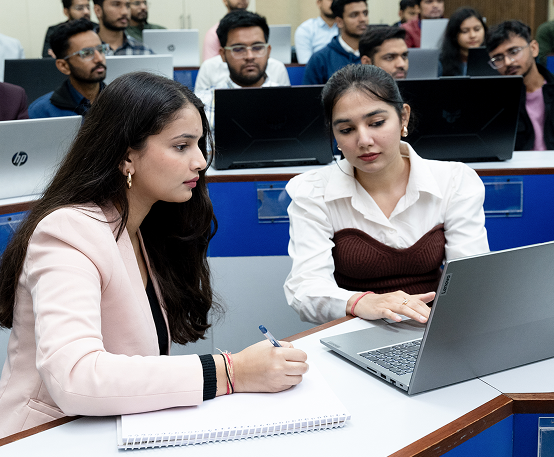 Students working on laptop